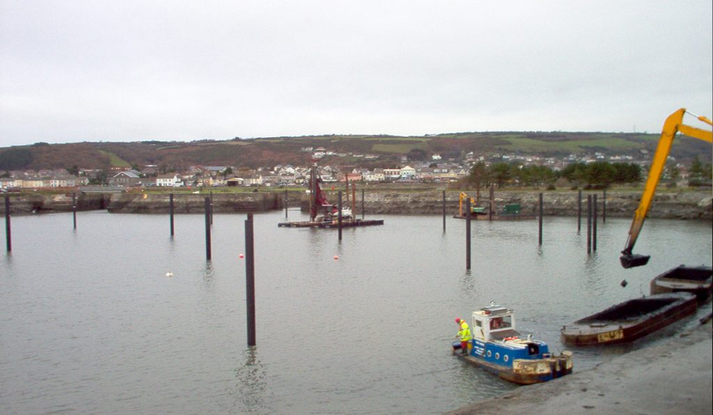 Installing Steel Piles for Marina Pontoon System - Sheet Piling ...